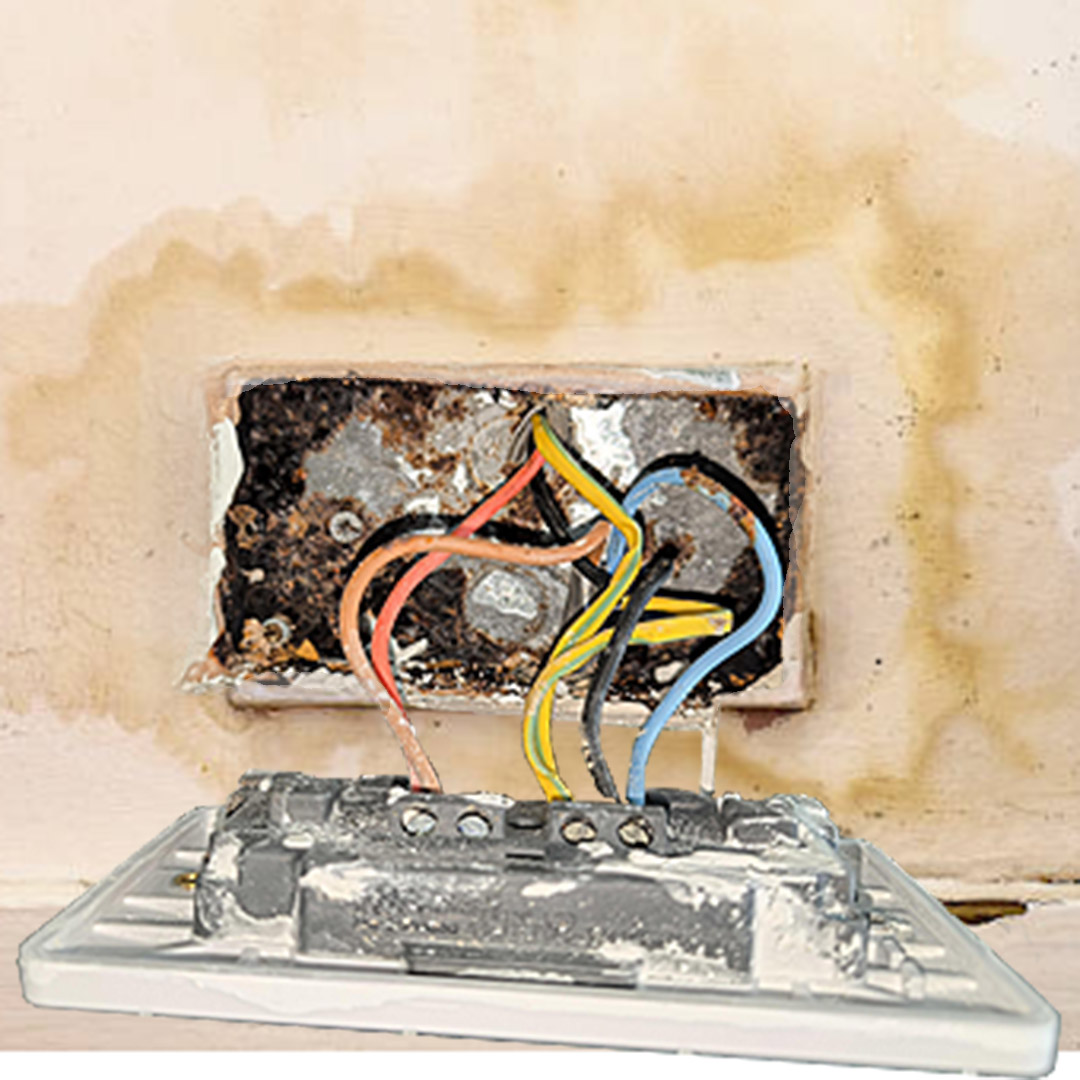 Can a damp wall cause electrical problems?
